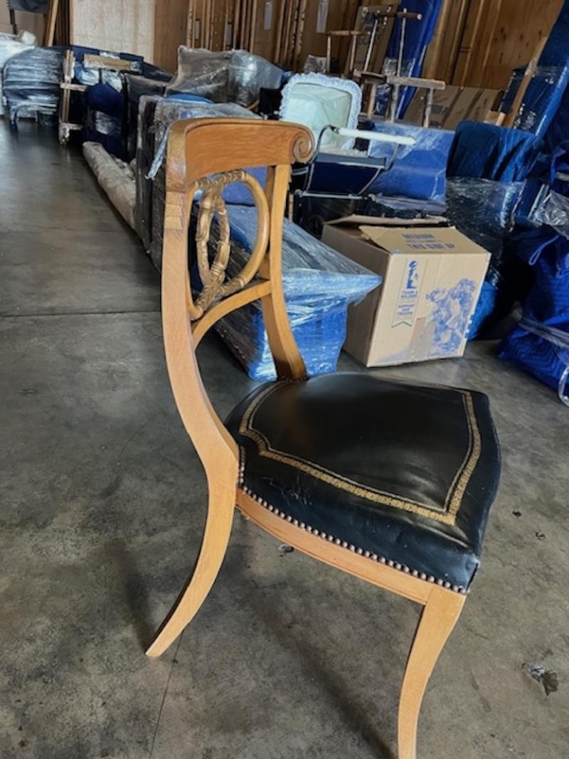 Set of four Snake Chairs with tooled leather seats and Game Table