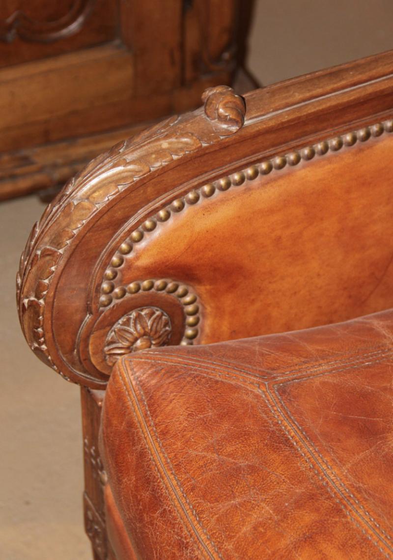 A Late 18th Century French Louis XVI Walnut Reclining Wing Chair