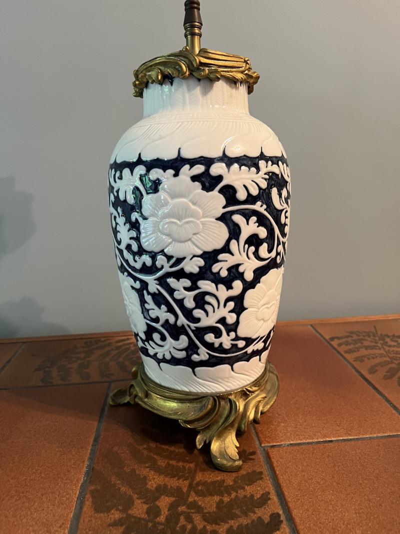 ANTIQUE CHINESE DEEP BLUE AND WHITE FLORAL CERAMIC LAMP WITH BRONZE MOUNTS