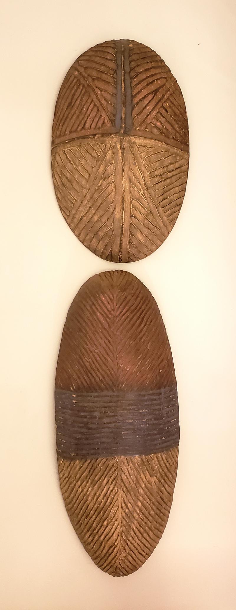 Dissimilar Pair of Decorative African Shields