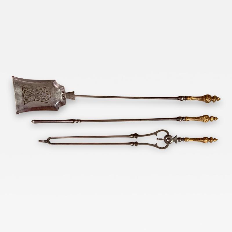 Fine set of steel and brass fire tools.