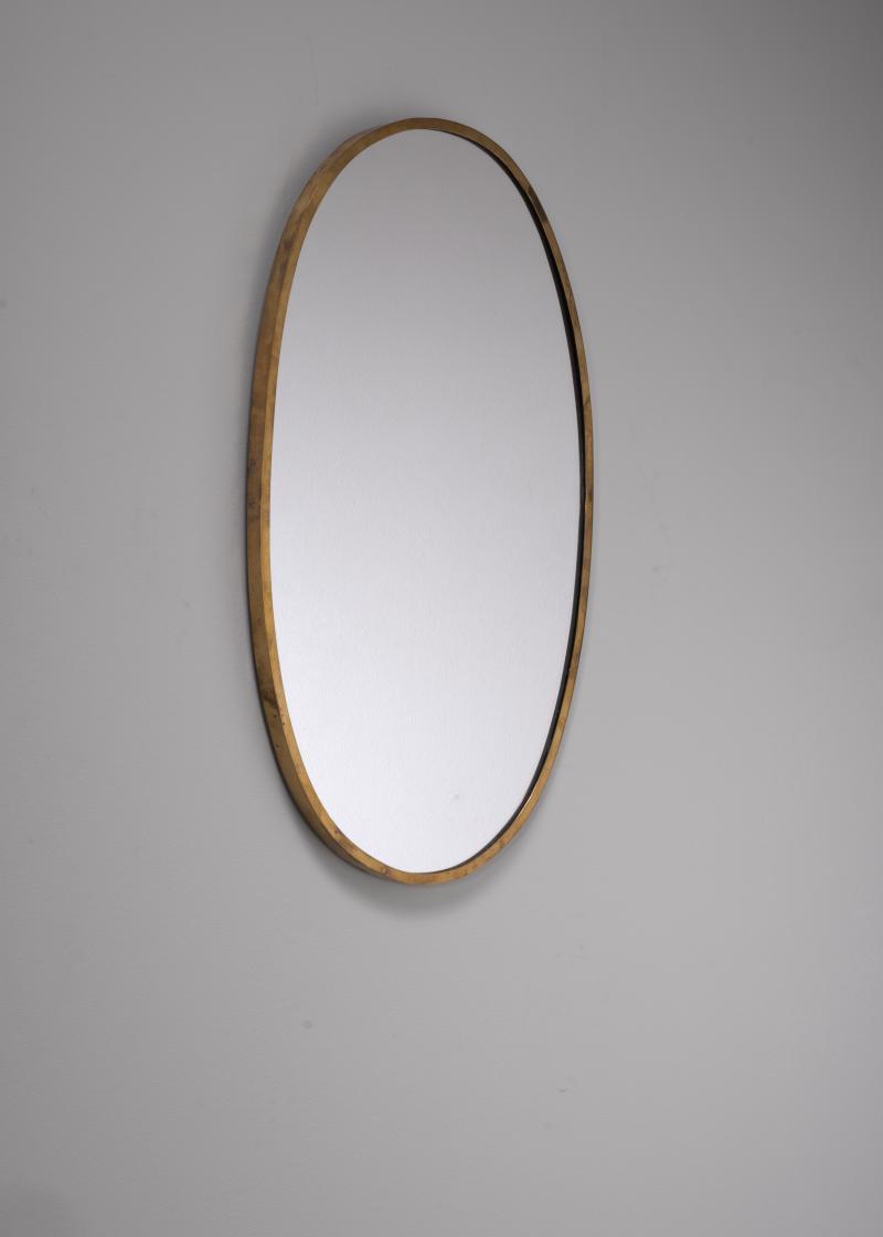 Oval brass wall mirror