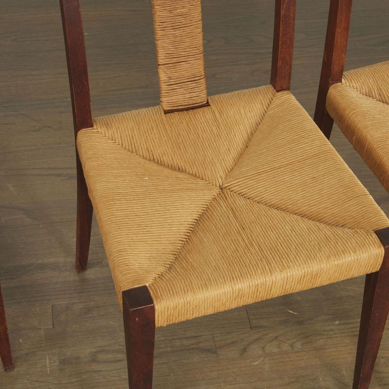 SET OF FOUR MID CENTURY MODERN ITALIAN WALNUT AND PAPER CORD CHAIRS
