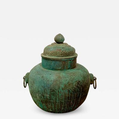 A Large Copper Vessel with Bronze Handles