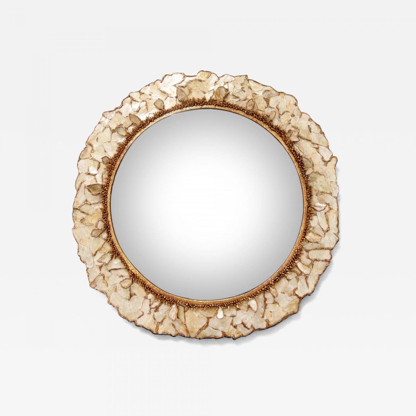 Unique artist convex mirror. Made of Mica and gilded resin.