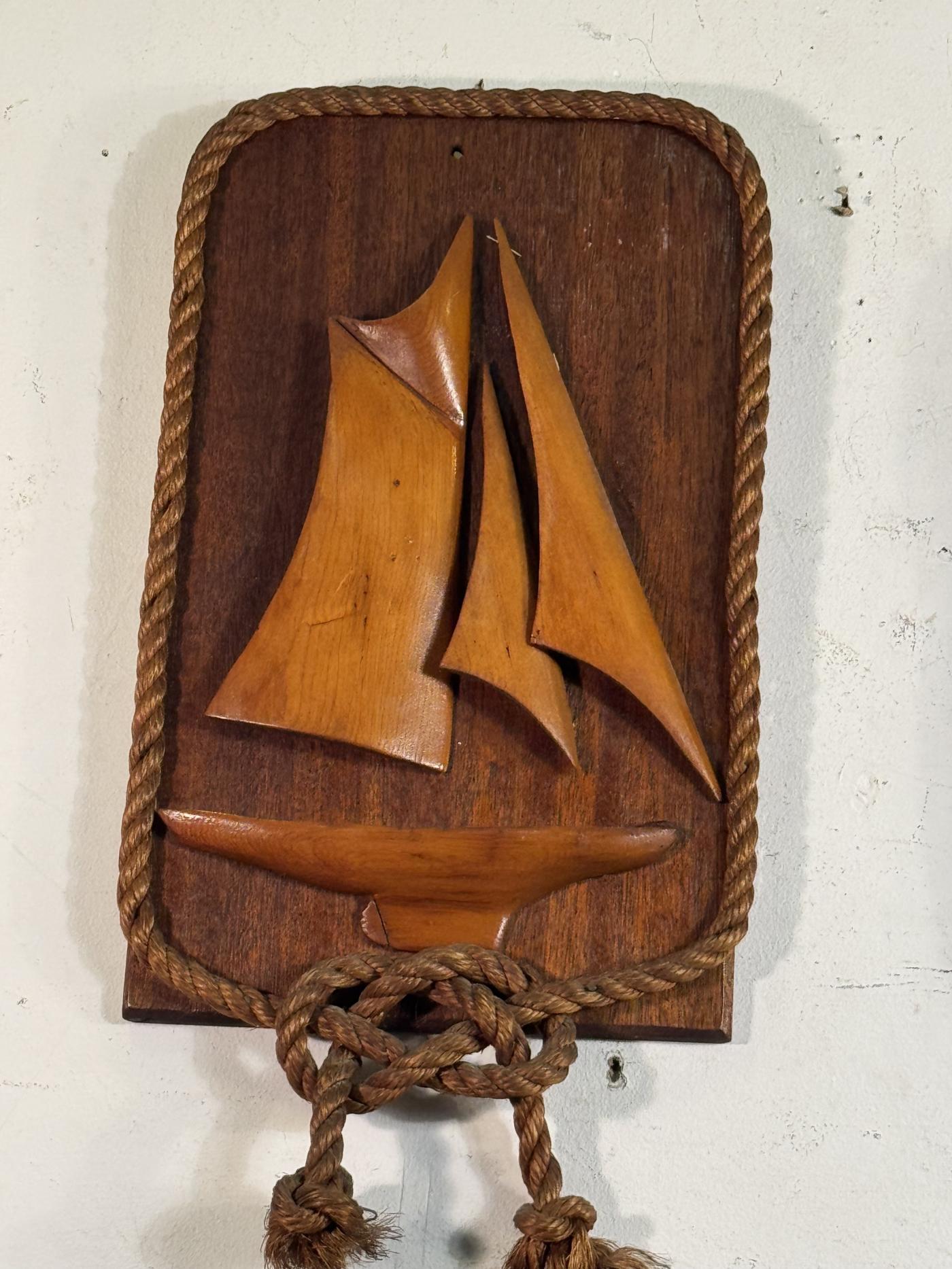 1940'S WOODEN CARVED SAILBOAT PLAQUES WITH KNOTTED ROPE FRAME