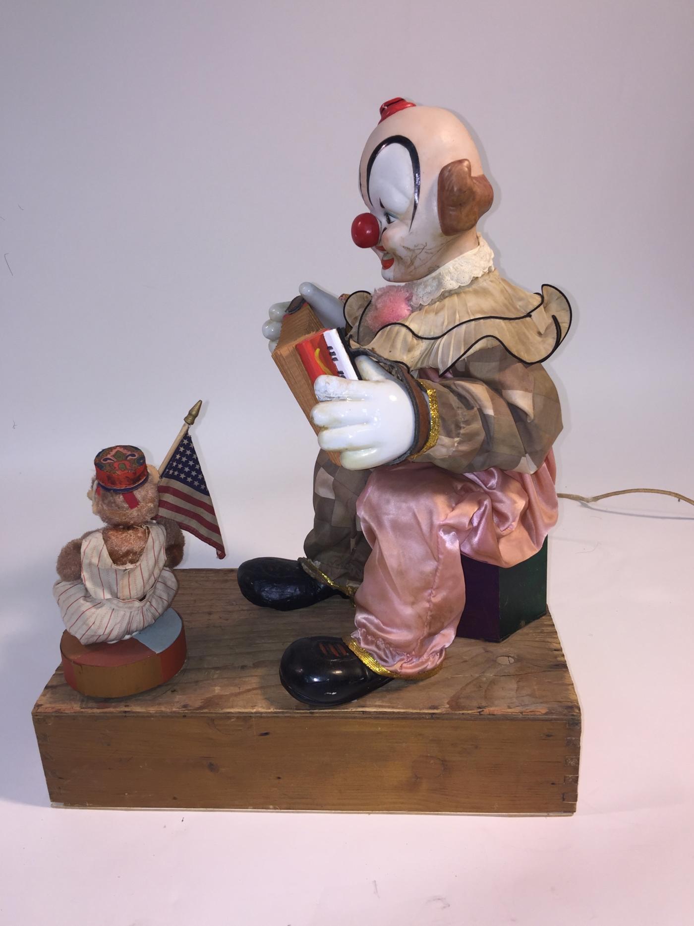 1940's HAND MADE CLOWN PLAYING ACCORDIAN AND MONKEY WITH FLAG AUTOMATON
