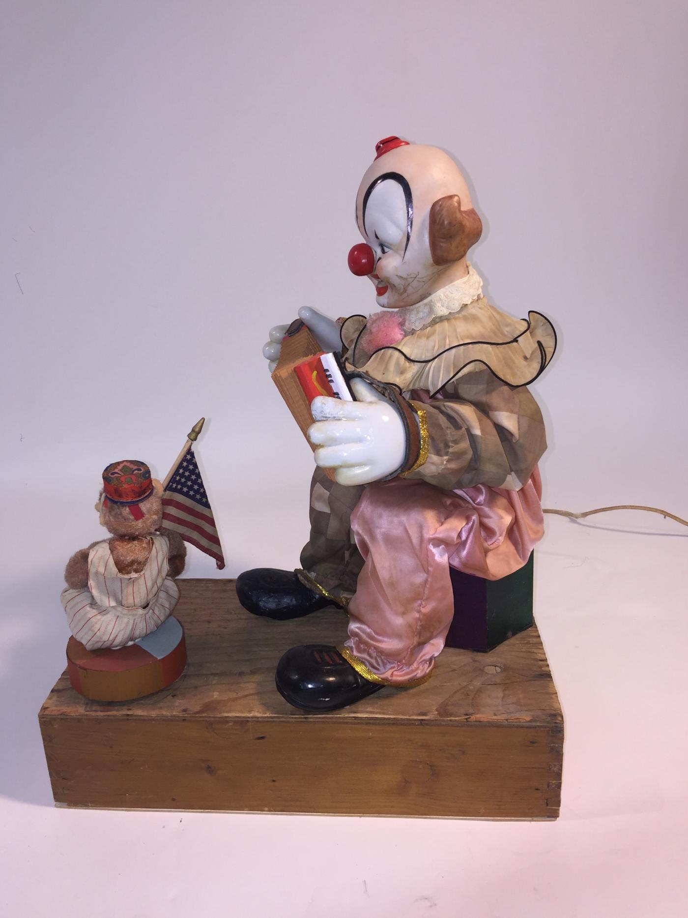 1940's HAND MADE CLOWN PLAYING ACCORDIAN AND MONKEY WITH FLAG AUTOMATON