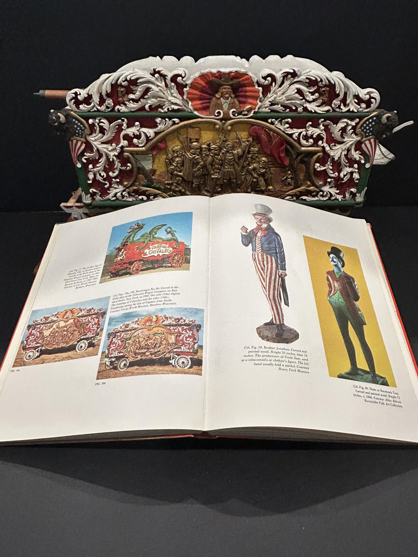 A Carved and Polychrome Paint-Decorated Model of a Circus Wagon.