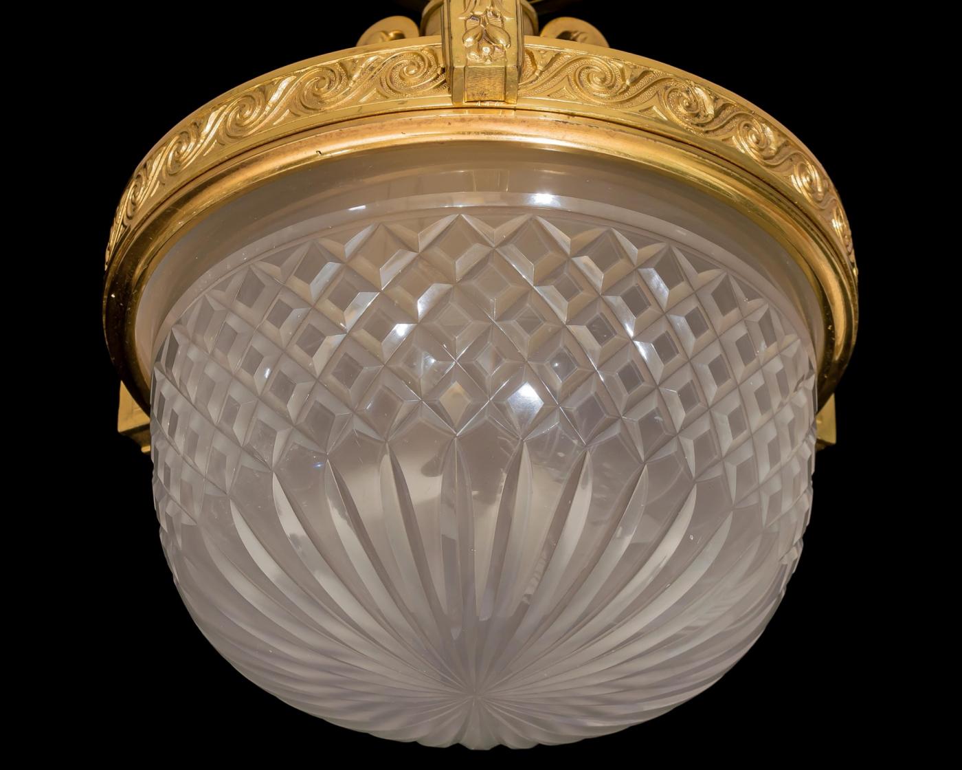A EDWARDIAN ORMOLU MOUNTED CEILING LIGHT