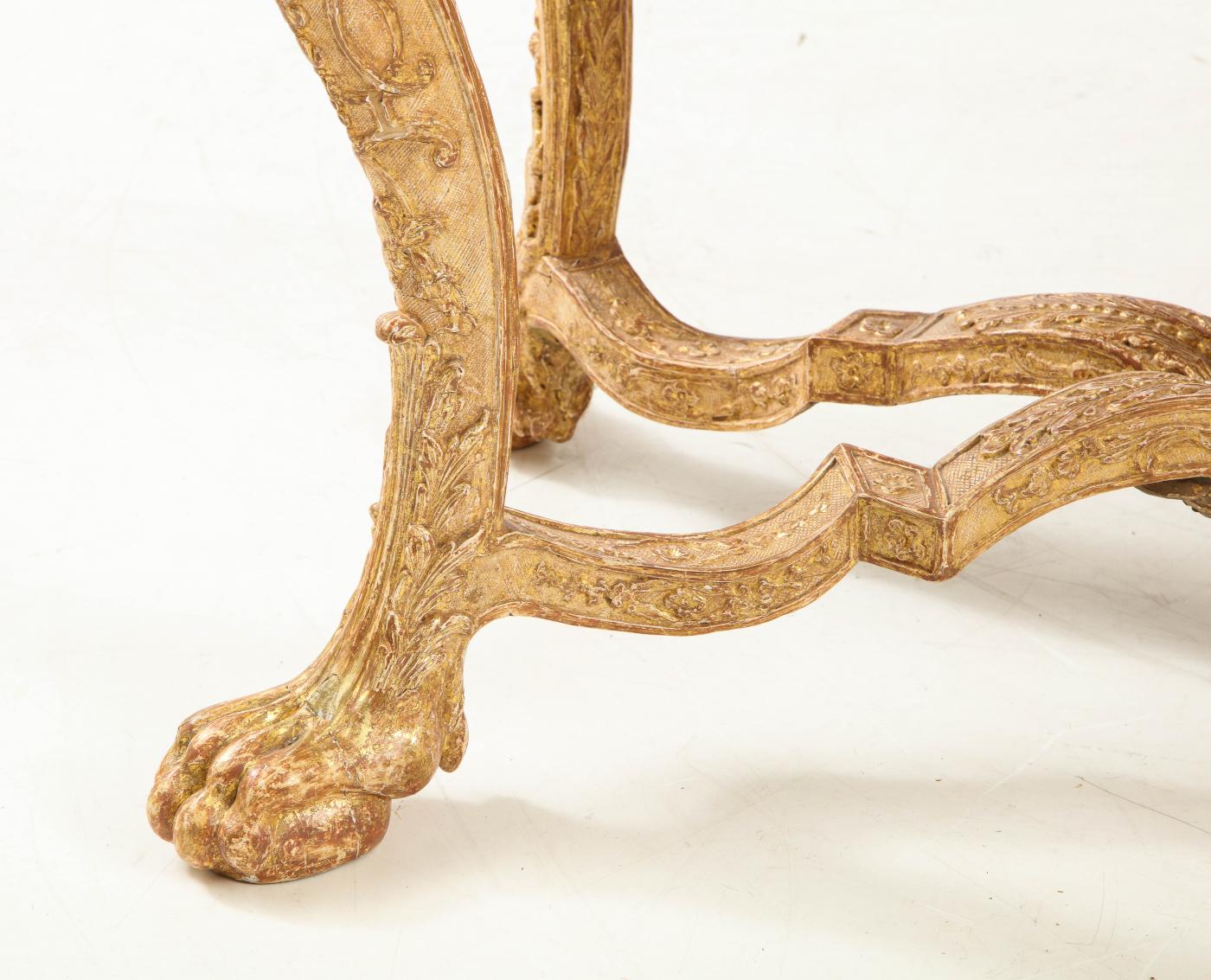 A German rococo carved and gilded console table.