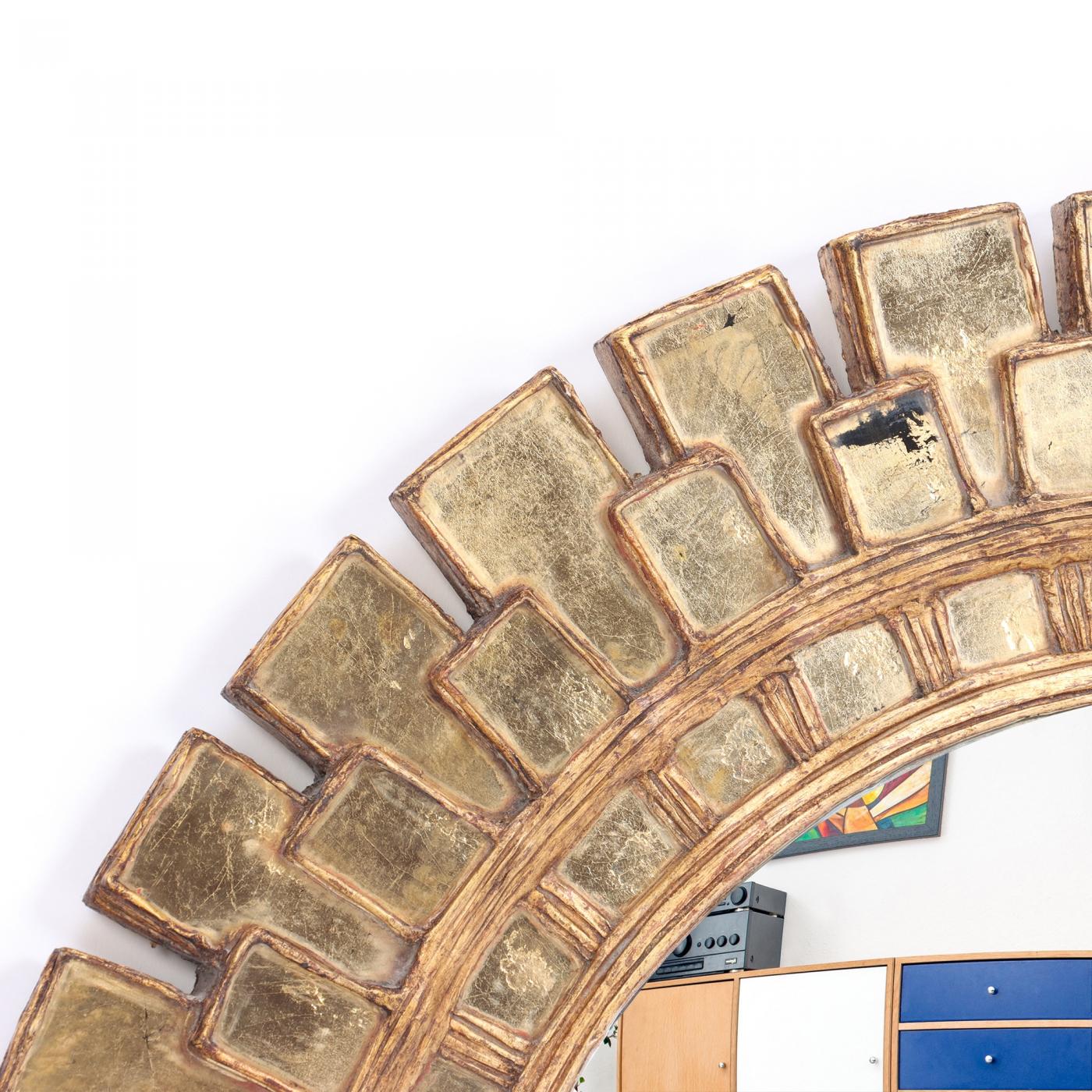 A glass and resin "Gerbera" mirror in the manner of Line Vautrin ...