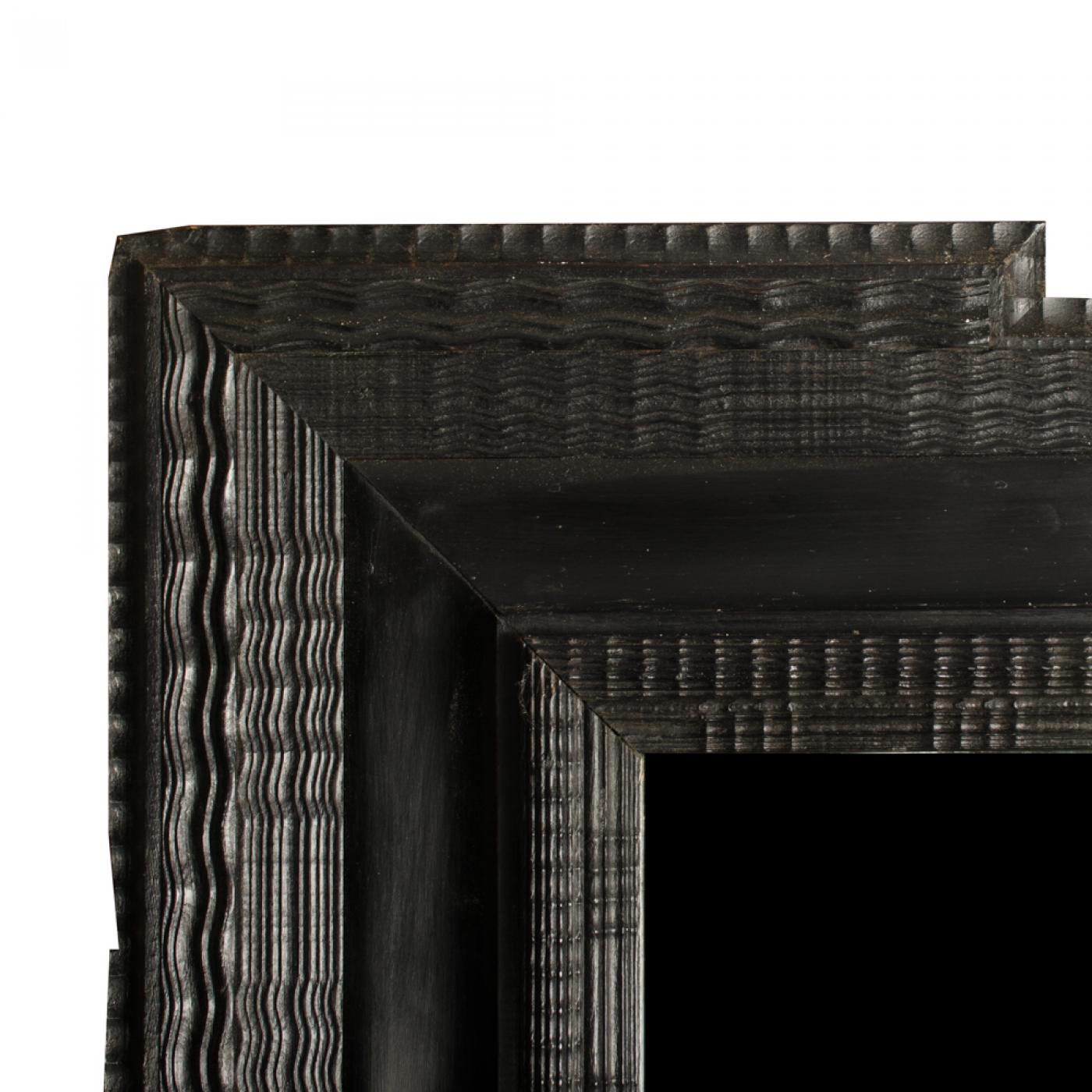 A large 19th Century Dutch style ebonized mirror