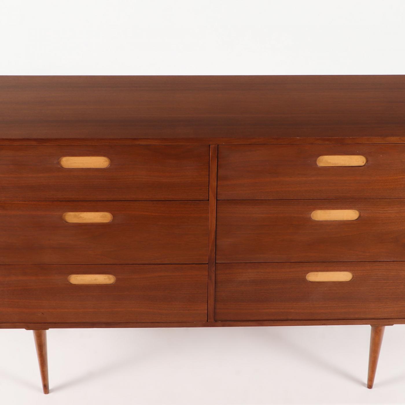 A mid century modern six drawers walnut dresser circa 1960.