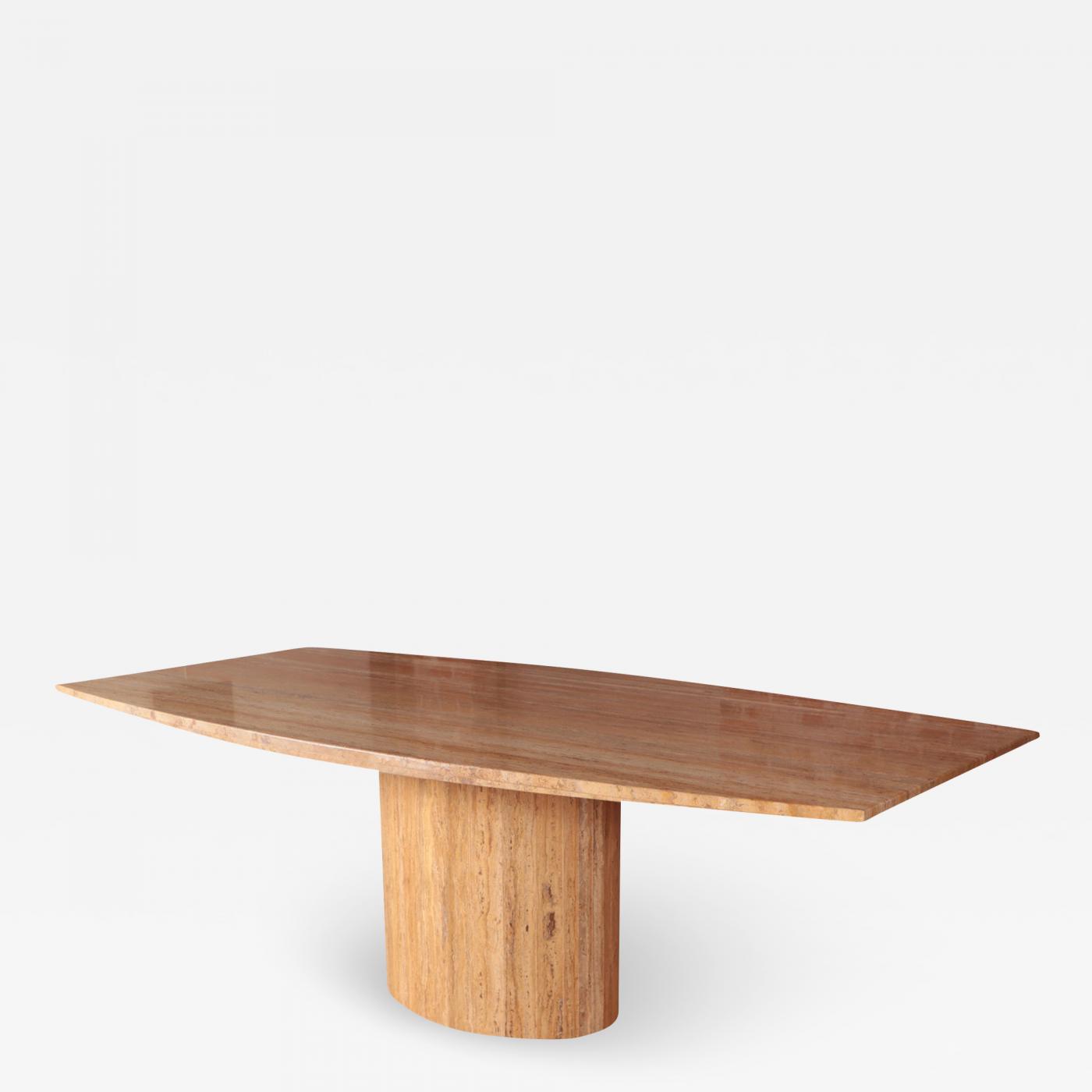 A monumental Iranian travertine pedestal dining room table. C 1970