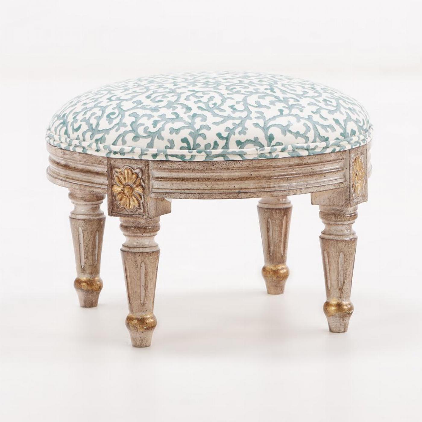 A pair of petite French Louis XVI style upholstered foot stools ...