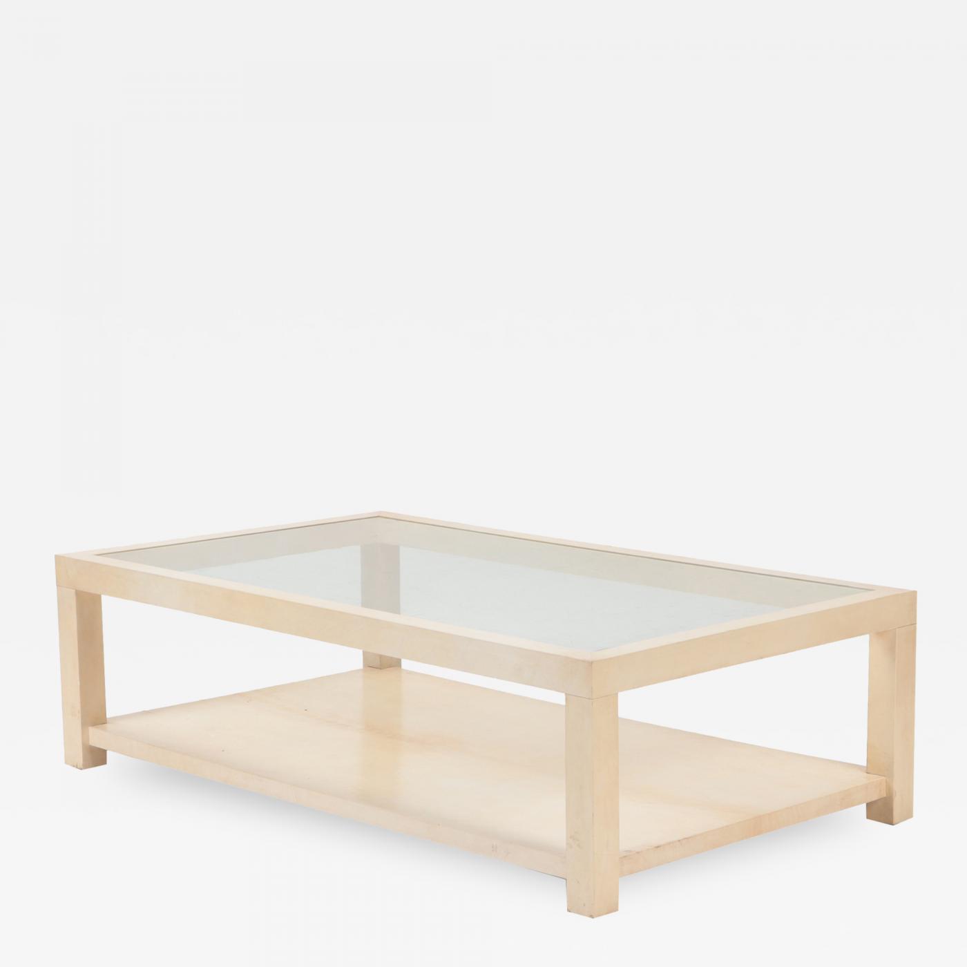 A parchment covered and glass coffee table in the manner of Samuel Marx.