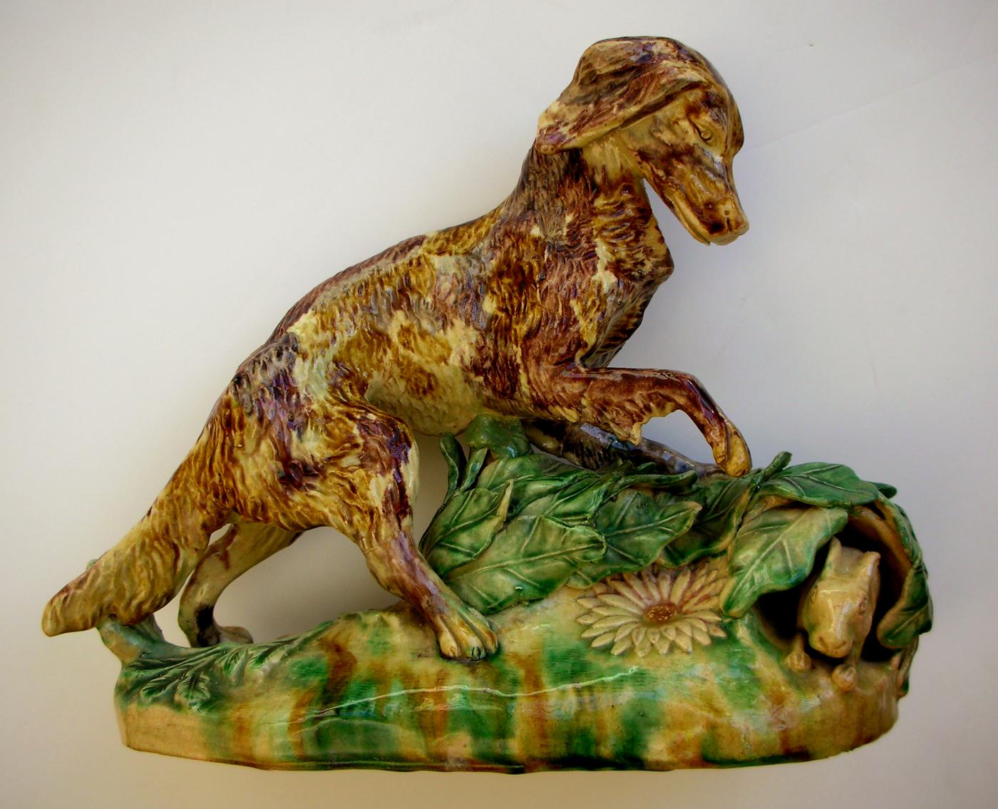 A rare English Yellow Ware figure of a hunting dog and hare