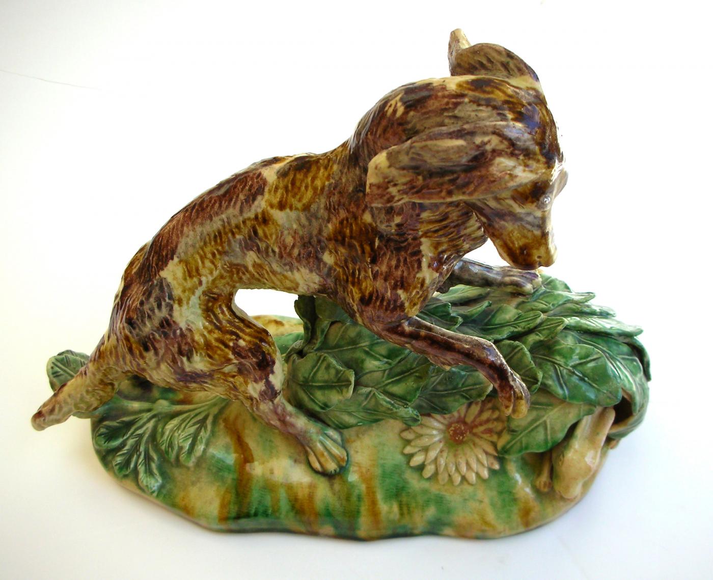 A rare English Yellow Ware figure of a hunting dog and hare