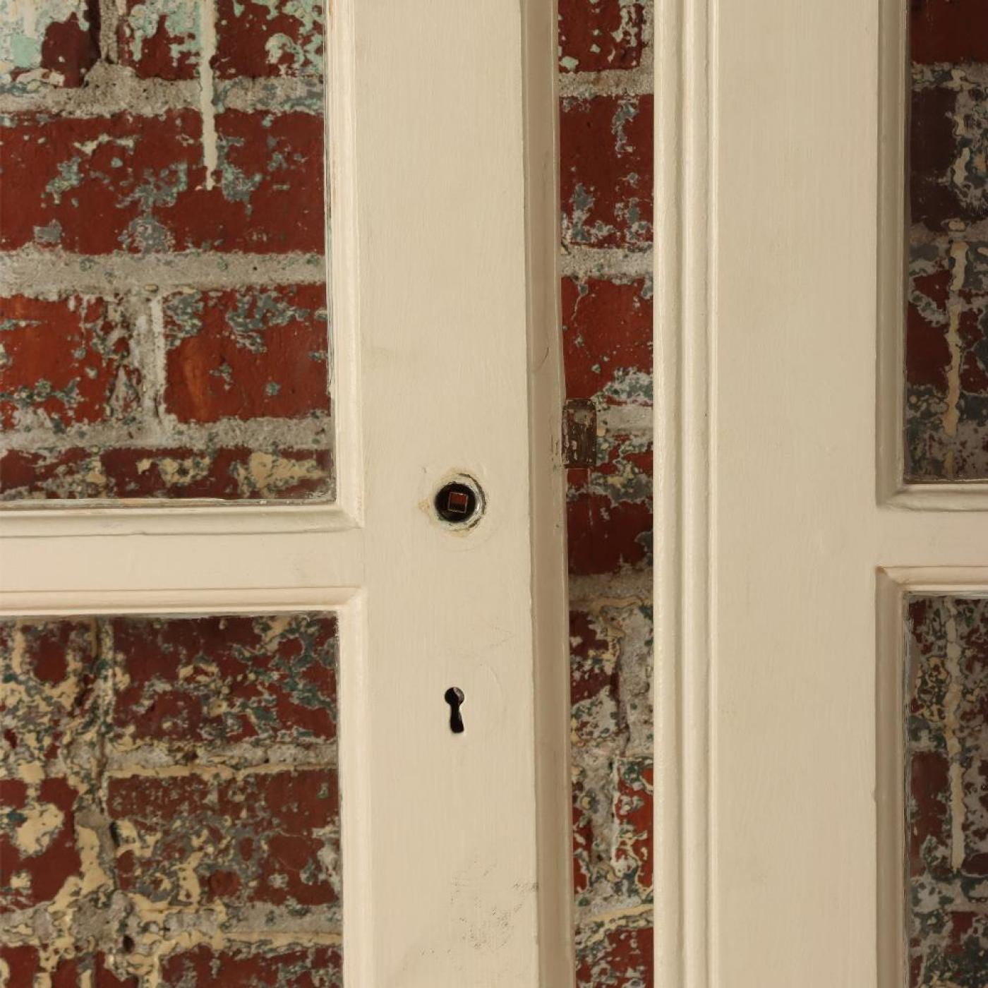 A set of four panel French entry doors circa 1900.