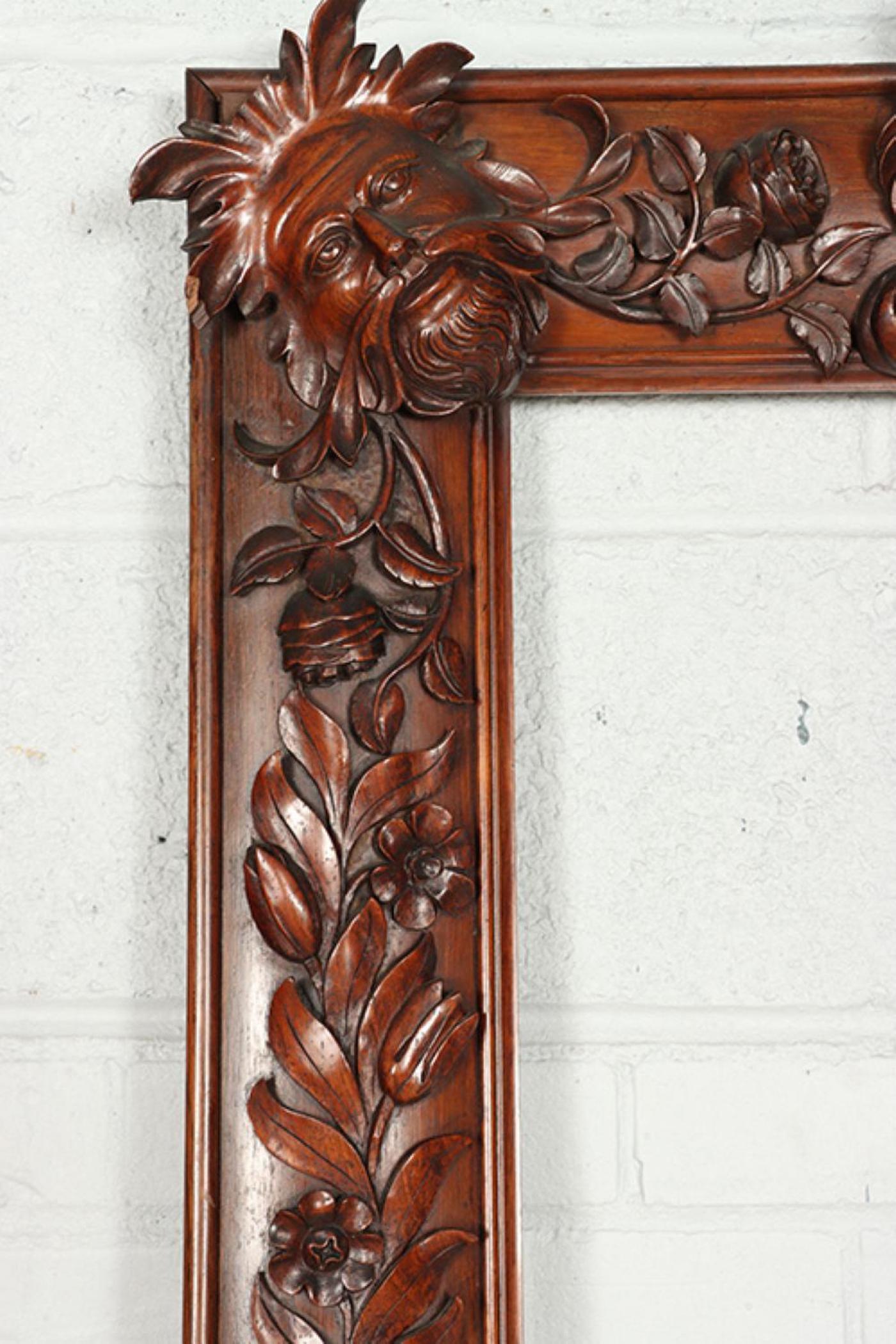 A stunning relief carved mahogany frame, C 1890.