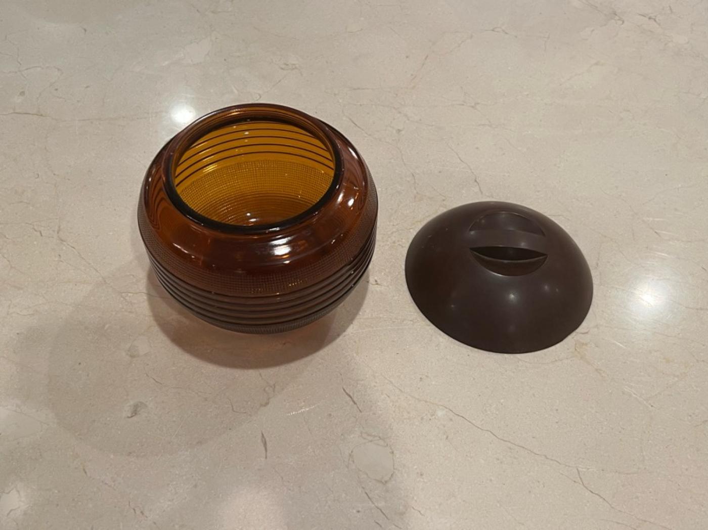 ART DECO AMBER GLASS AND BAKELITE SPHERE TOBACCO JAR