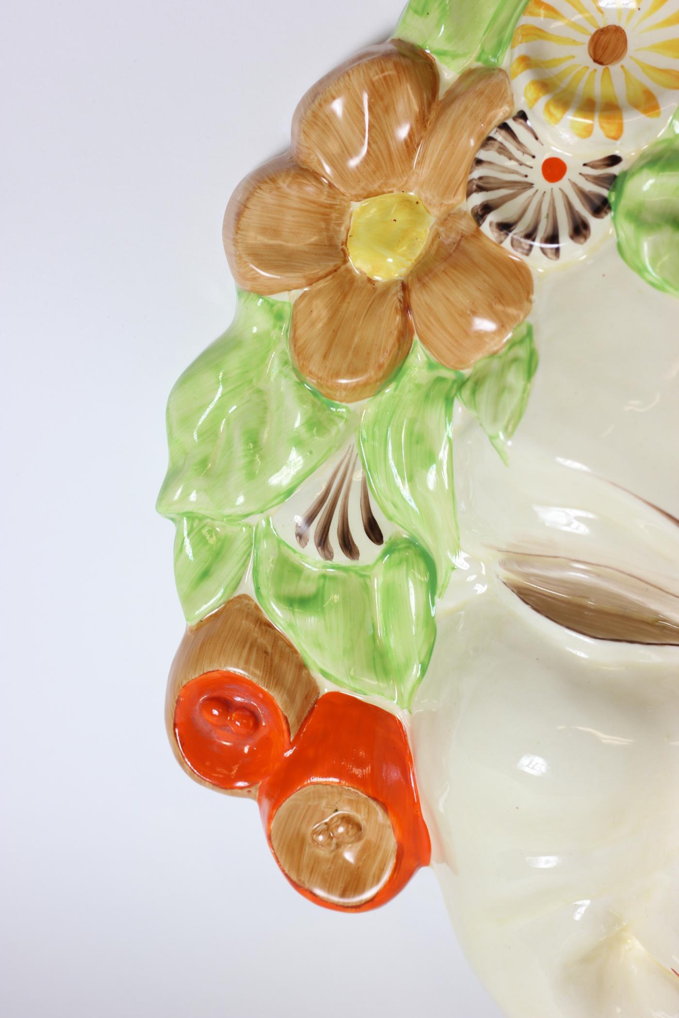 Clarice Cliff - Clarice Cliff bizarre Art Deco mask of Flora, England