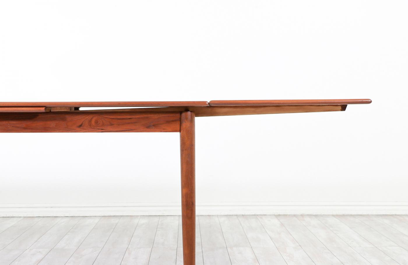 Danish Modern Expanding Teak Dining Table with Draw-Leaves