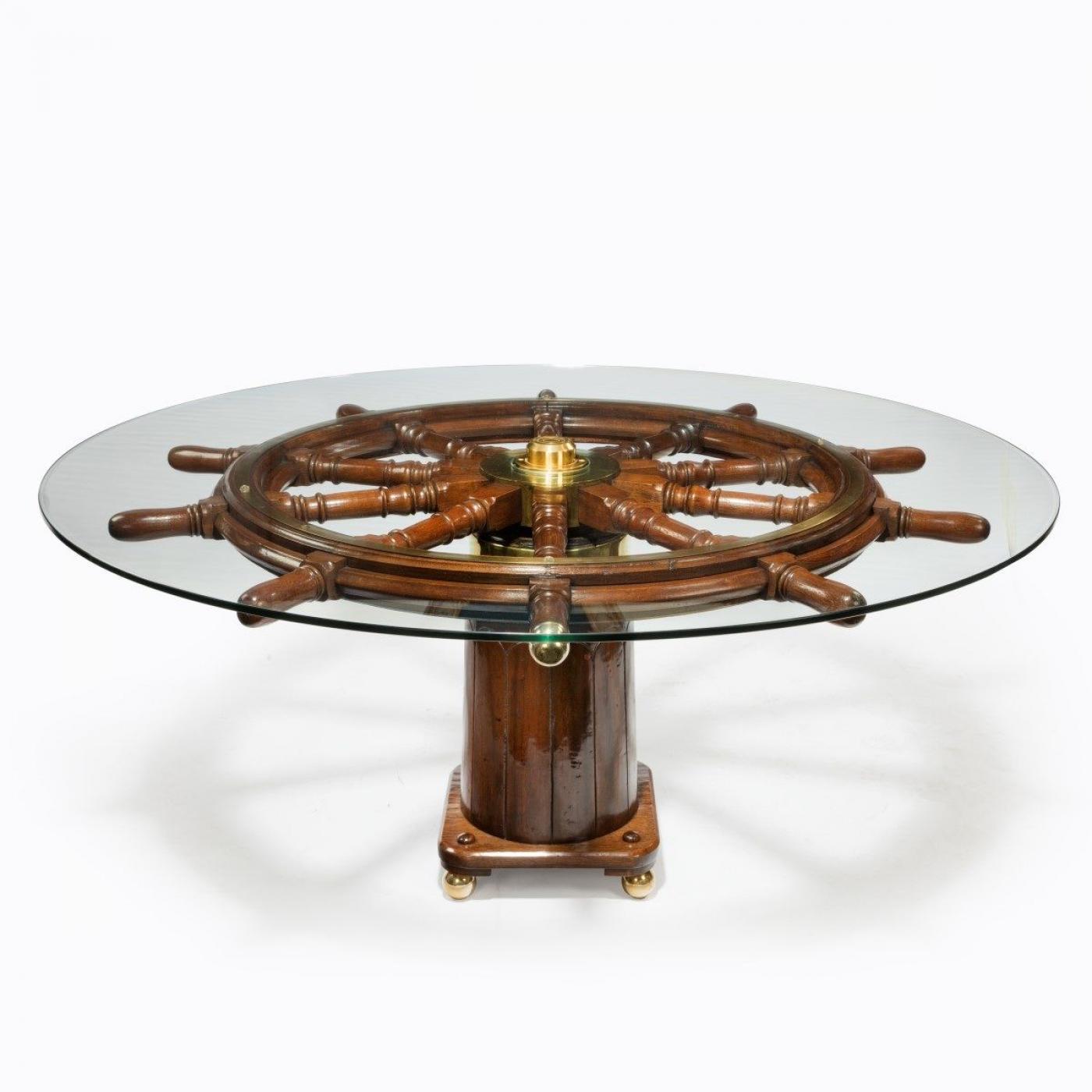 Dining table made from a 19th Century ship's steering wheel