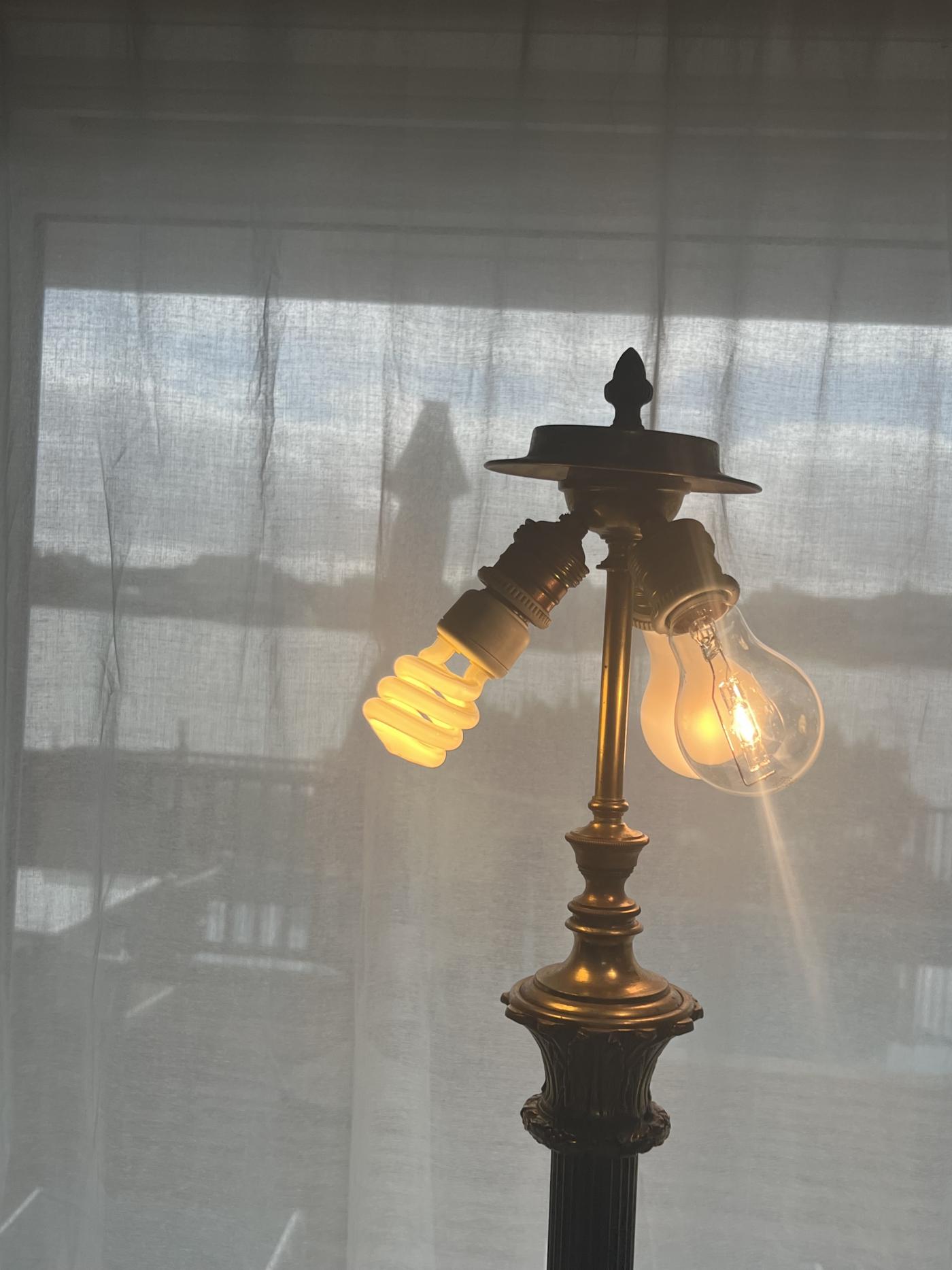 EMPIRE DORE BRONZE AND MARBLE WITH SCULPTED PANELS OF PUTTI FLOOR LAMP