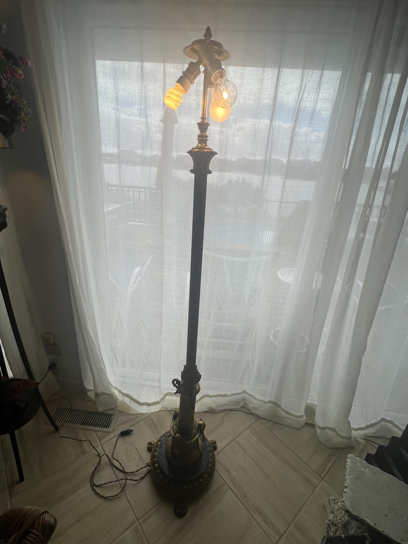 EMPIRE DORE BRONZE AND MARBLE WITH SCULPTED PANELS OF PUTTI FLOOR LAMP