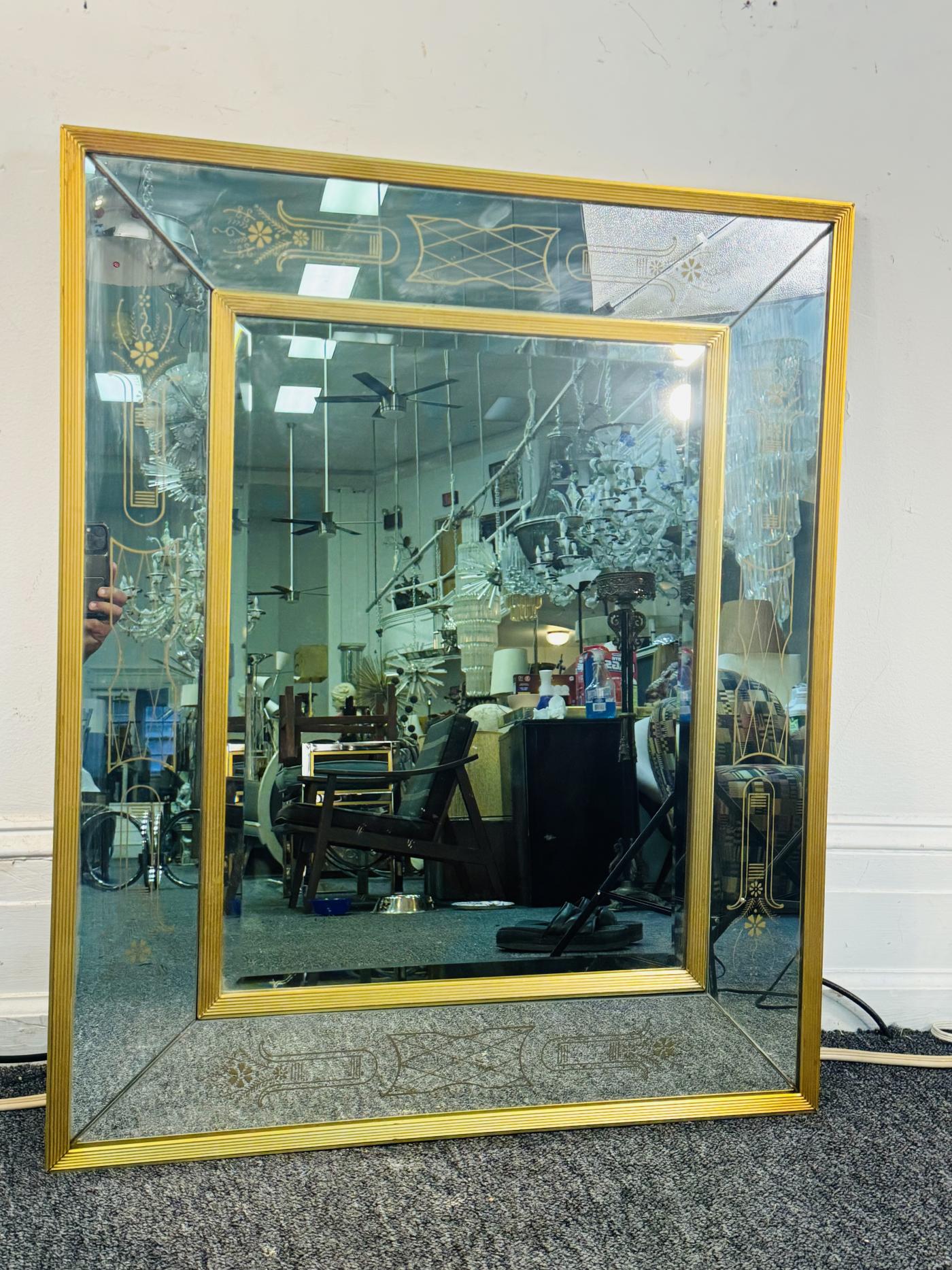 EXCEPTIONAL FRENCH MODERNE BRASS MIRROR WITH GOLD DESIGN