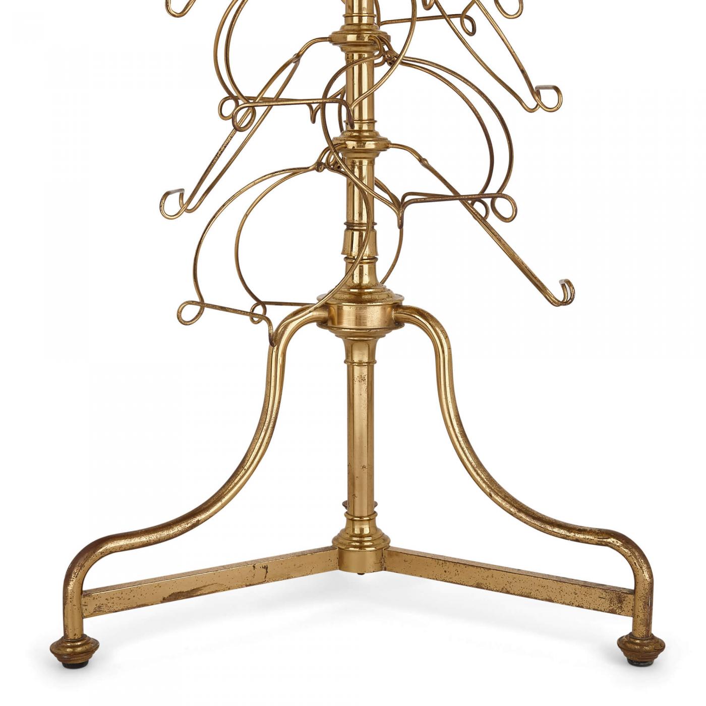 Elegant brass revolving display stand for plates