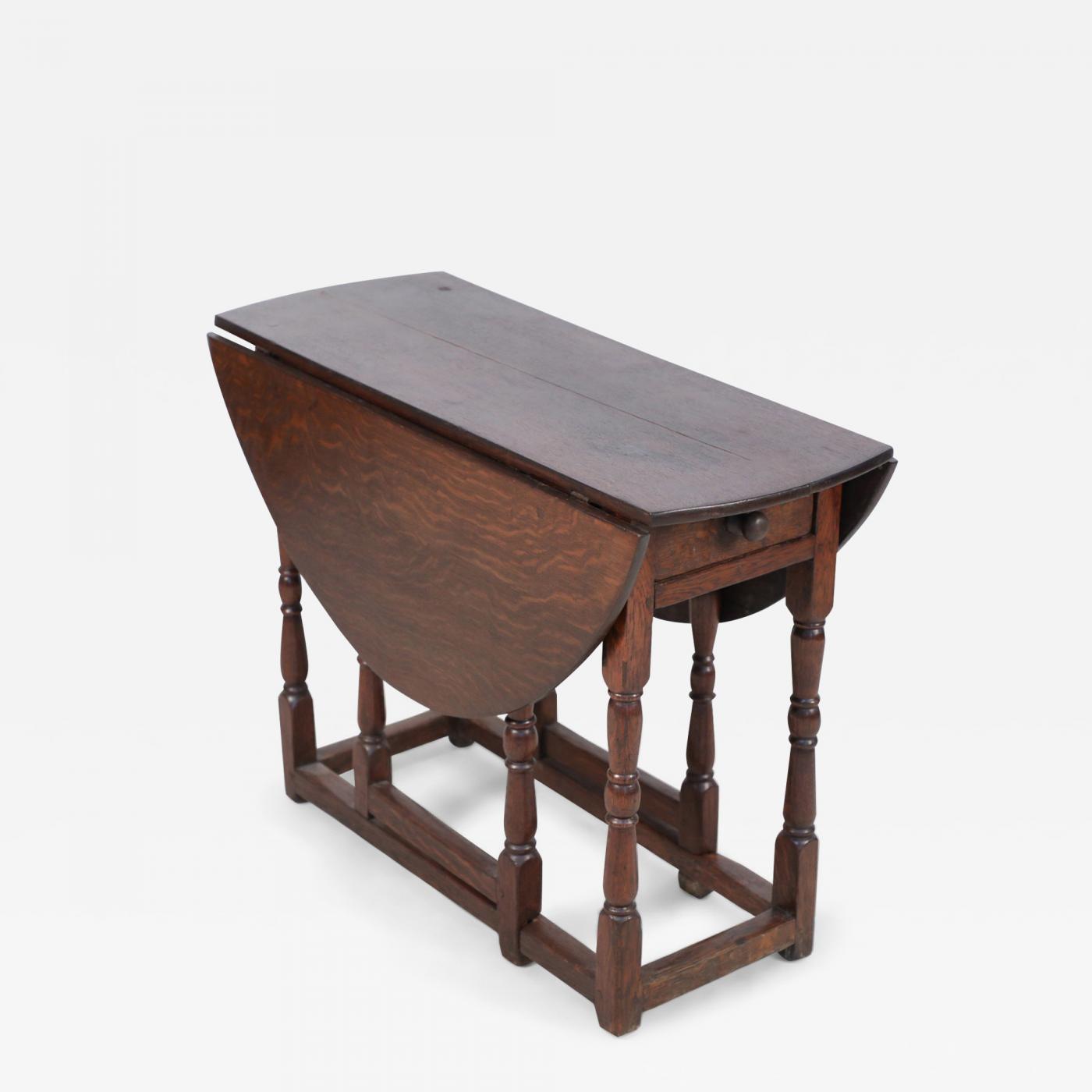 English Renaissance Style Walnut Drop Leaf Center Table
