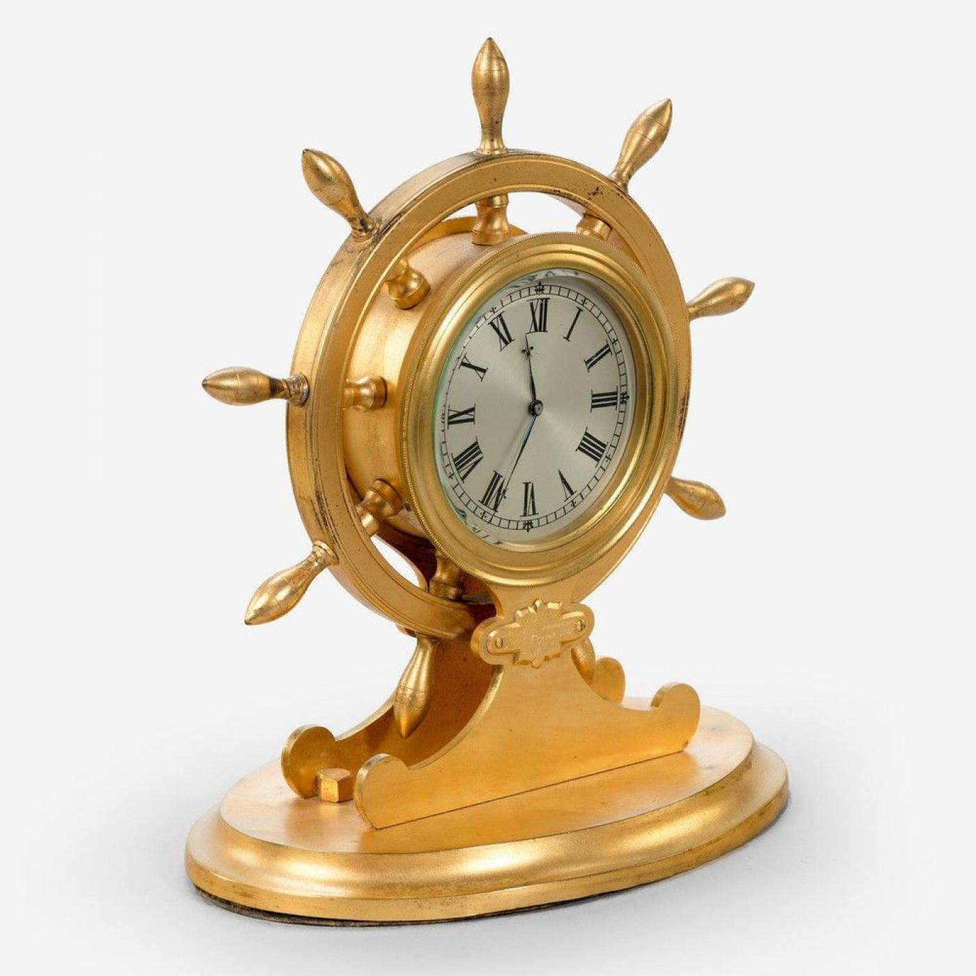 English gilt metal ship's wheel desk clock