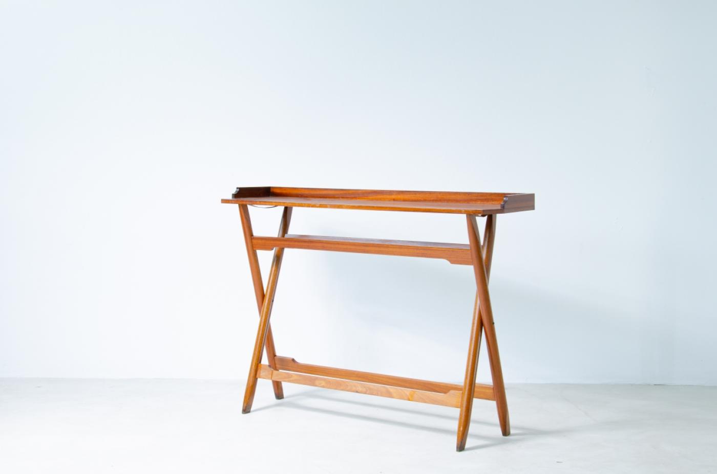 Folding console table in teak wood.