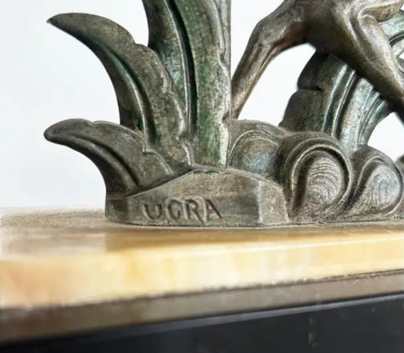 French Art Deco Marble Onyx Mantel Clock with Gazelles Signed Ucra 1930s