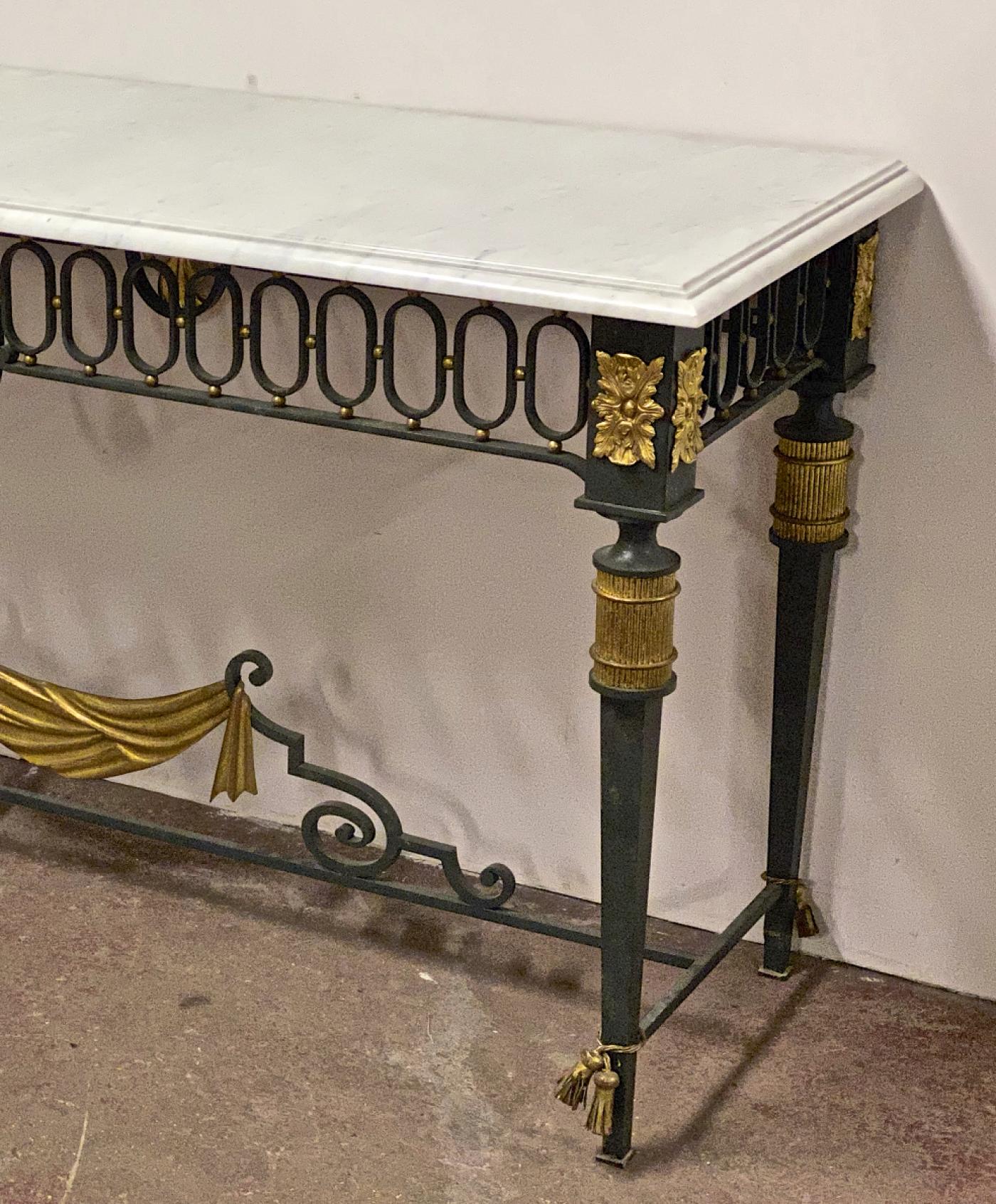 French Neo classical gold leaf metal patinated console with a marble top