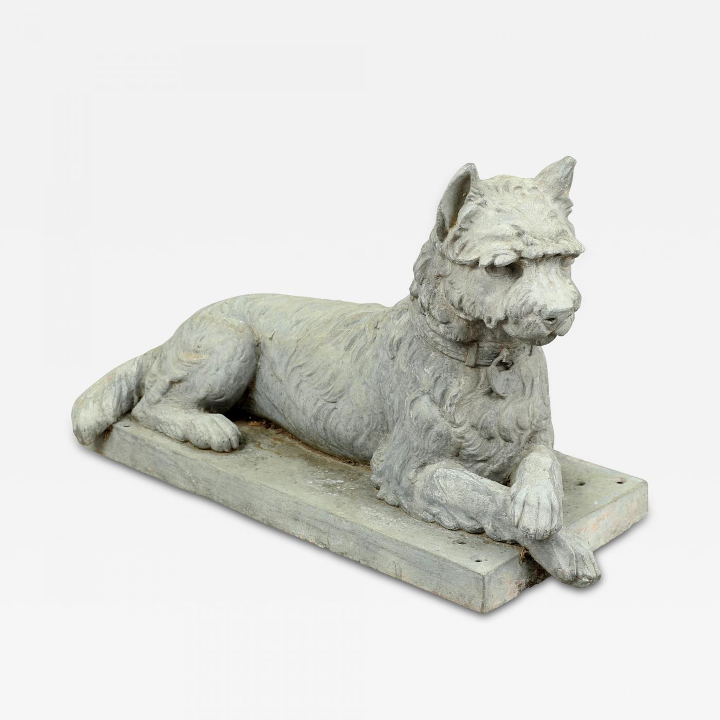 GARDEN STATUE OF RECUMBENT DOG