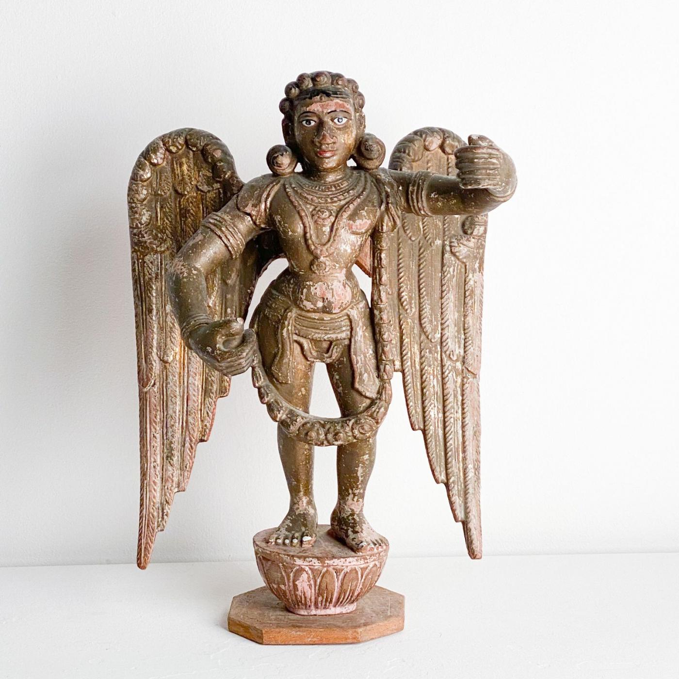Large Carved and Giltwood Figure of an "Angel", India, 19th century