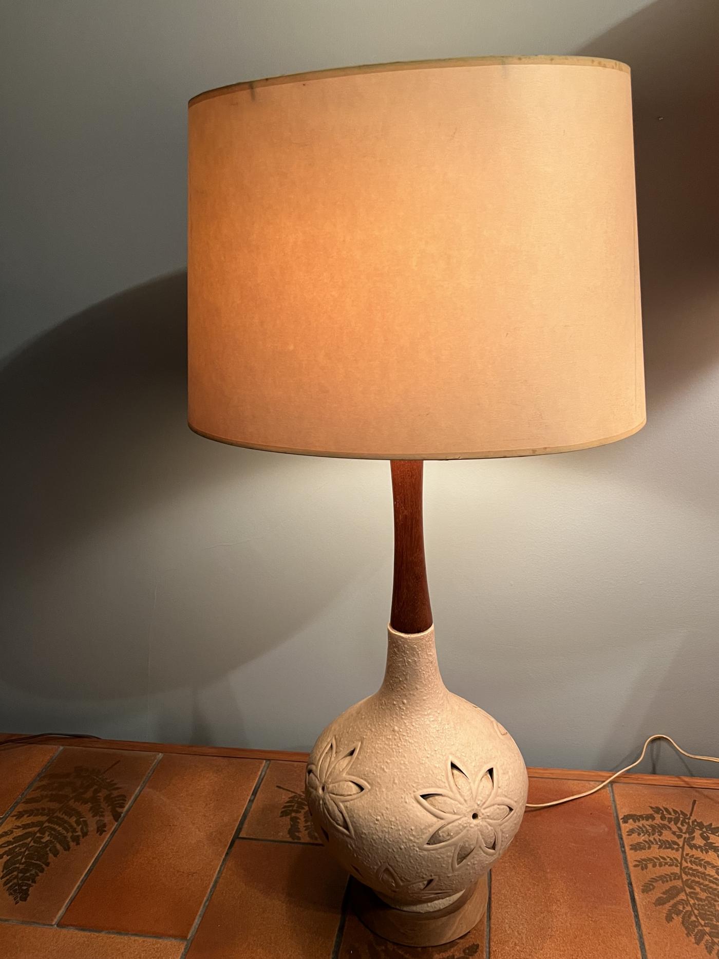MID CENTURY FLOWER INCISED CERAMIC AND WOOD LAMPS WITH INTERNAL LIGHT