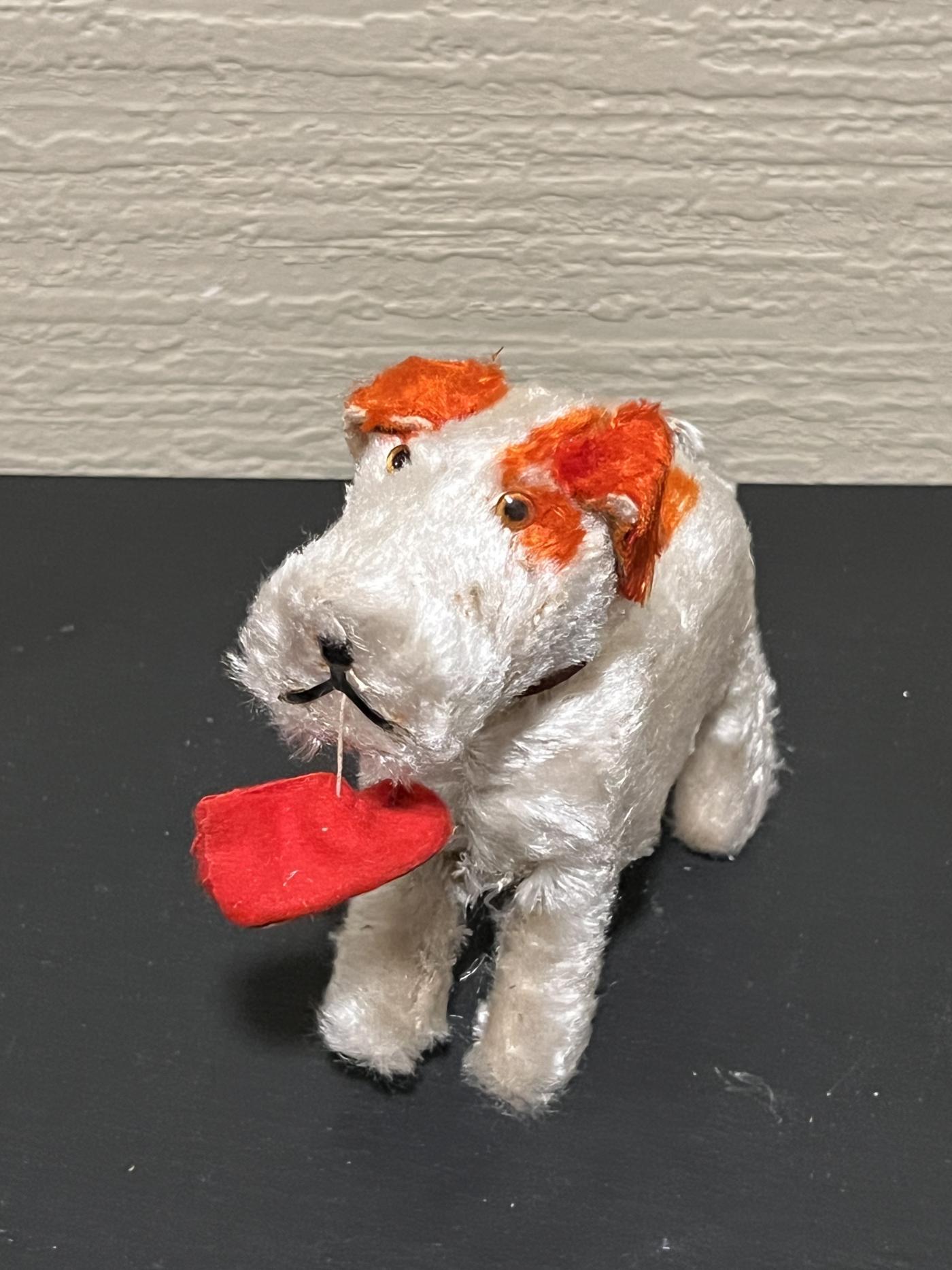 MID CENTURY PLAYFUL PUPPY KEY WIND DOG WITH SHOE TOY