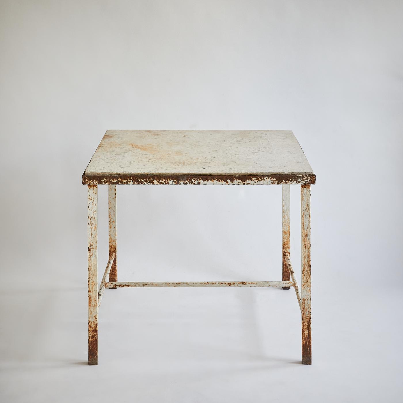 MODERNIST STONE + STEEL TABLE