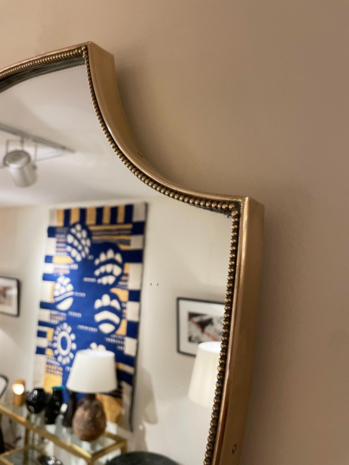 Mid-Century Brass Shield Mirror