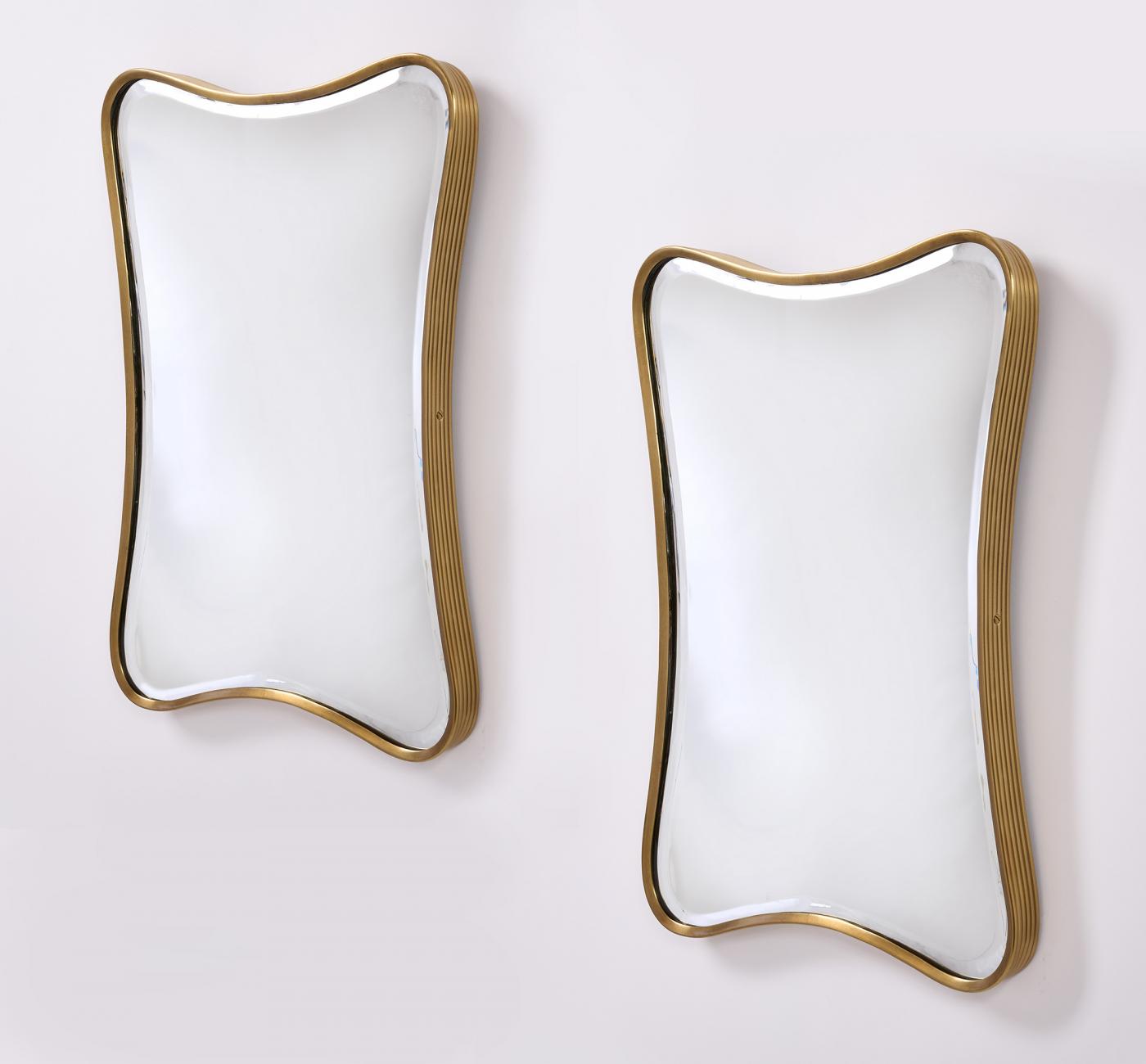 Pair of Diminutive and Charming Shaped Ribbed Brass Mirrors, Italy 1950's