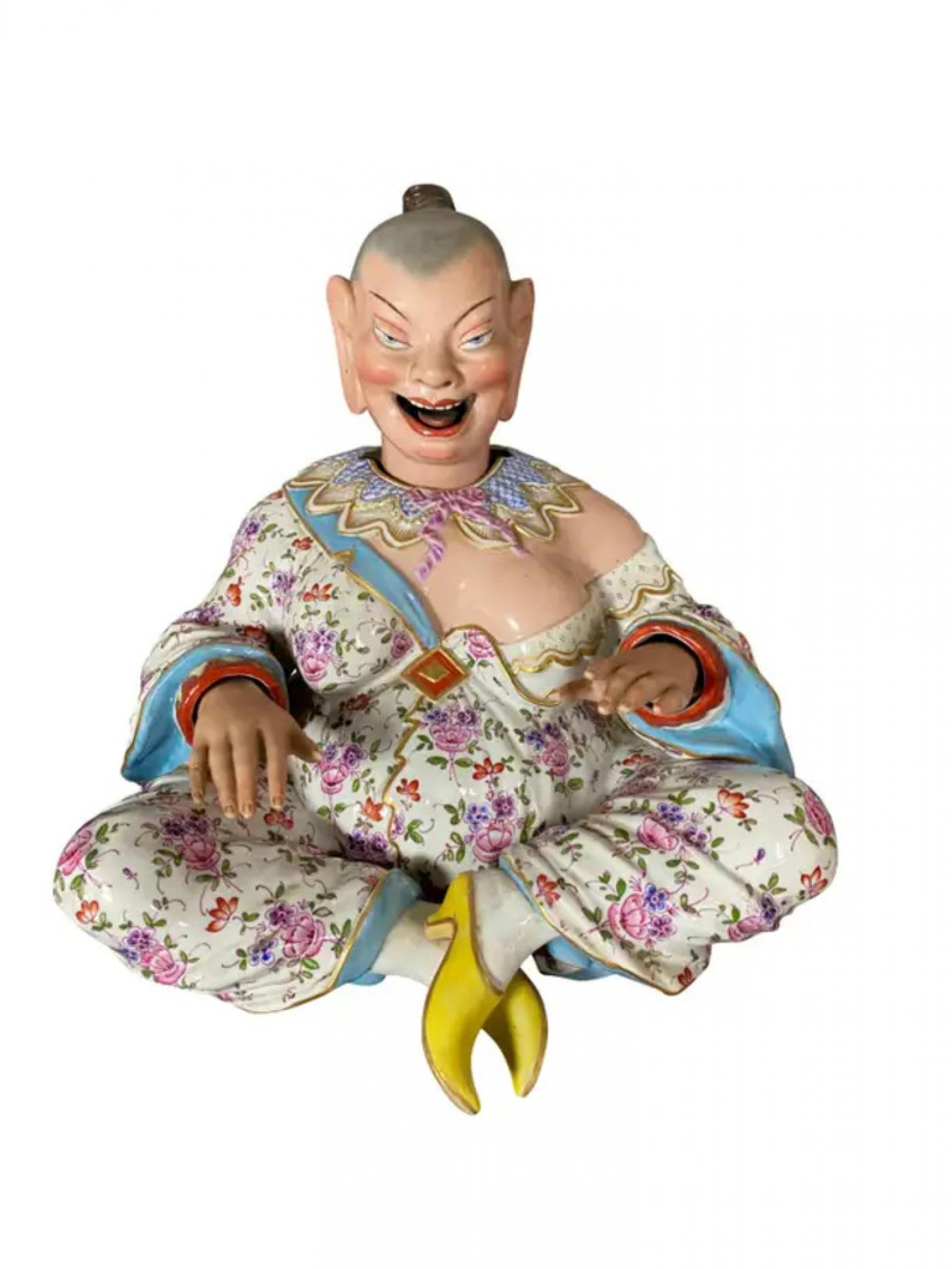 Pair of German Chinoiserie Porcelain Figures of Seated "Nodders"