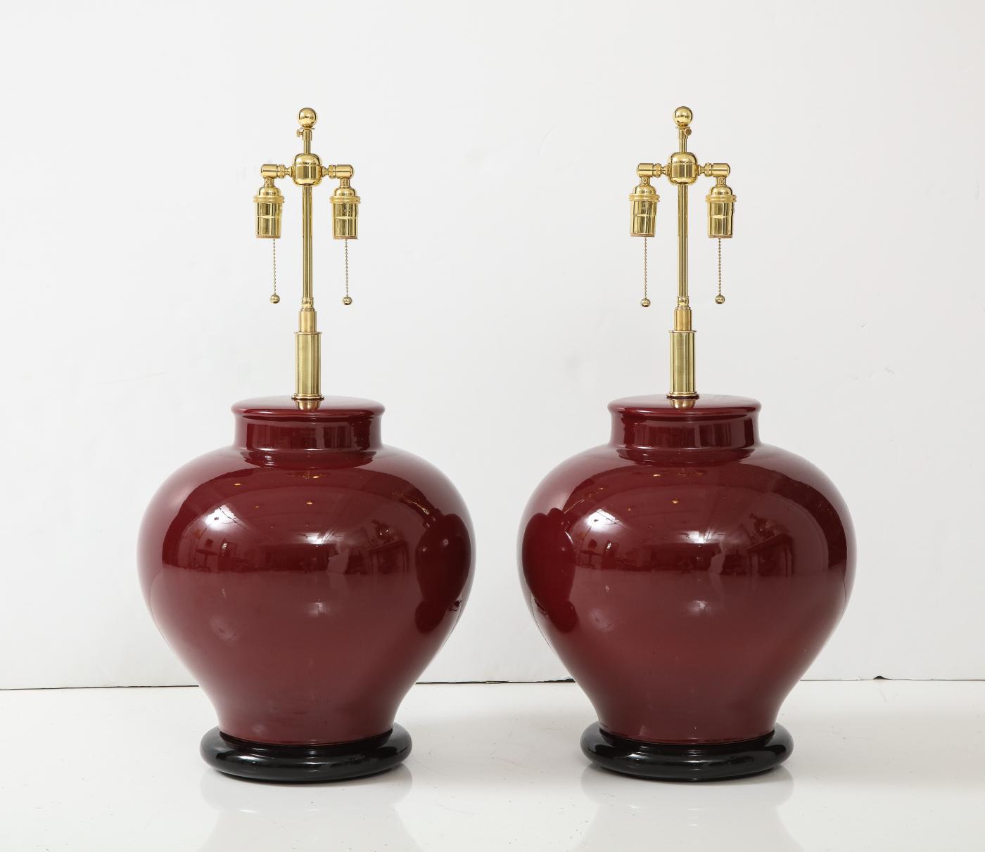 Pair of Large Ceramic Lamps with a Rich Burgundy Glaze finish.