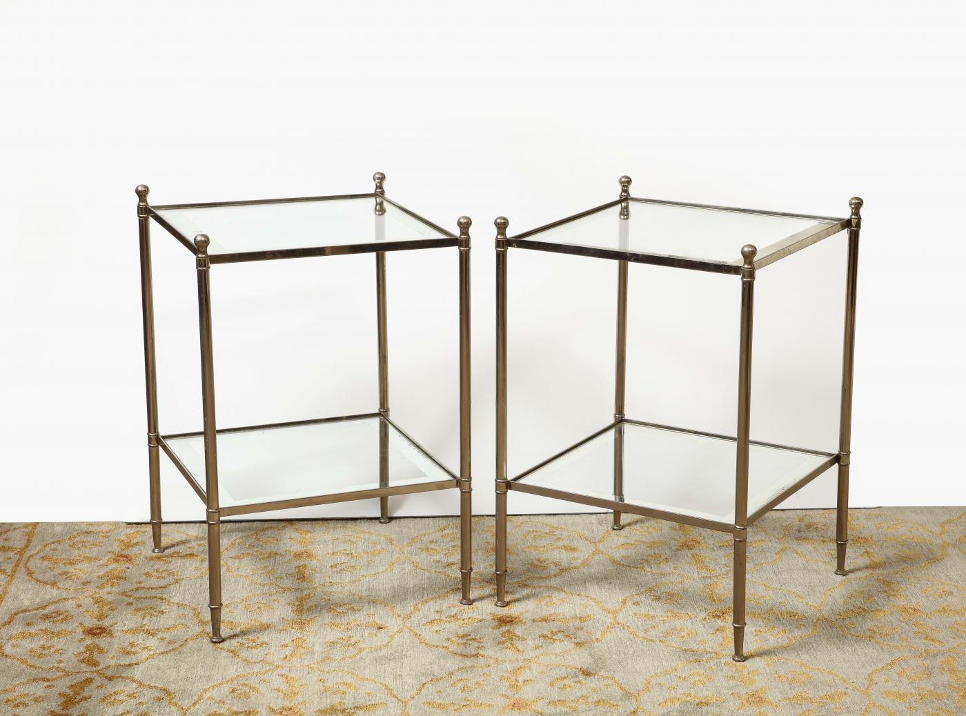 Pair of two-tiered silver gilt side tables