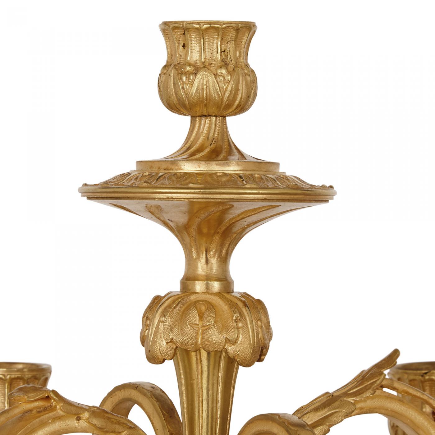 Three-piece Louis XV Rococo style porcelain and ormolu clock set